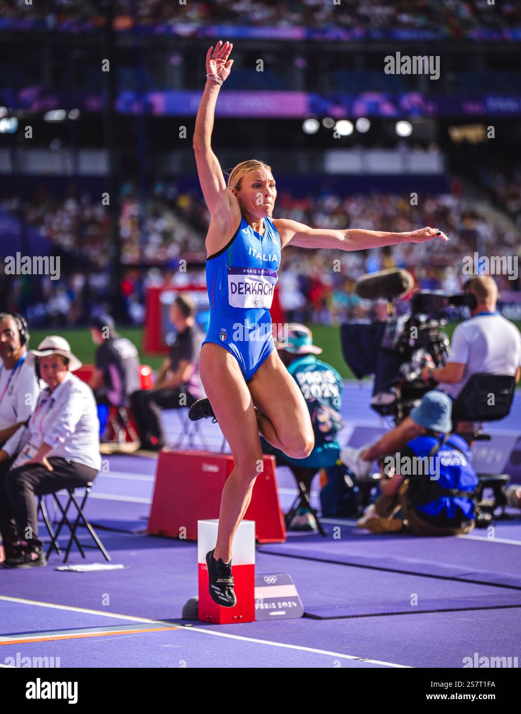 Dariya Derkach participating in the triple jump at the Paris 2024 ...
