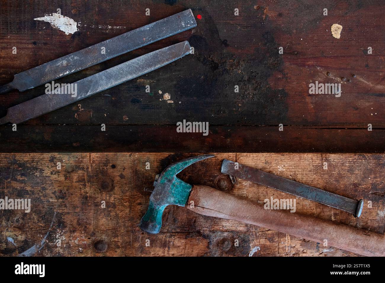 Old grungy and dirty wooden workbench with woodworking tools on it ...