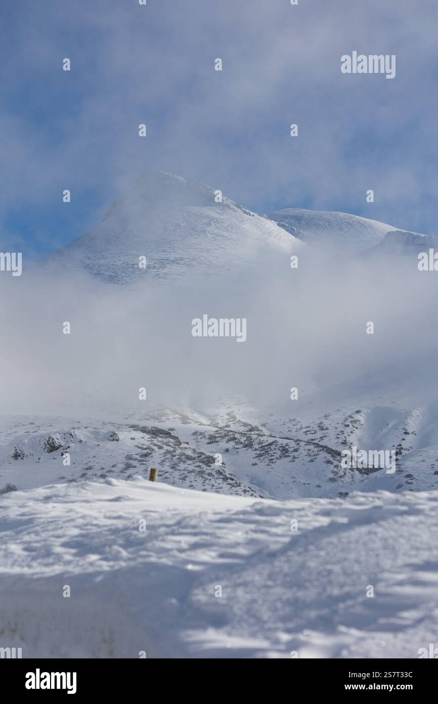 Snowy Mountain Peaks and Mist in Puerto de San Glorio, Parque Regional ...
