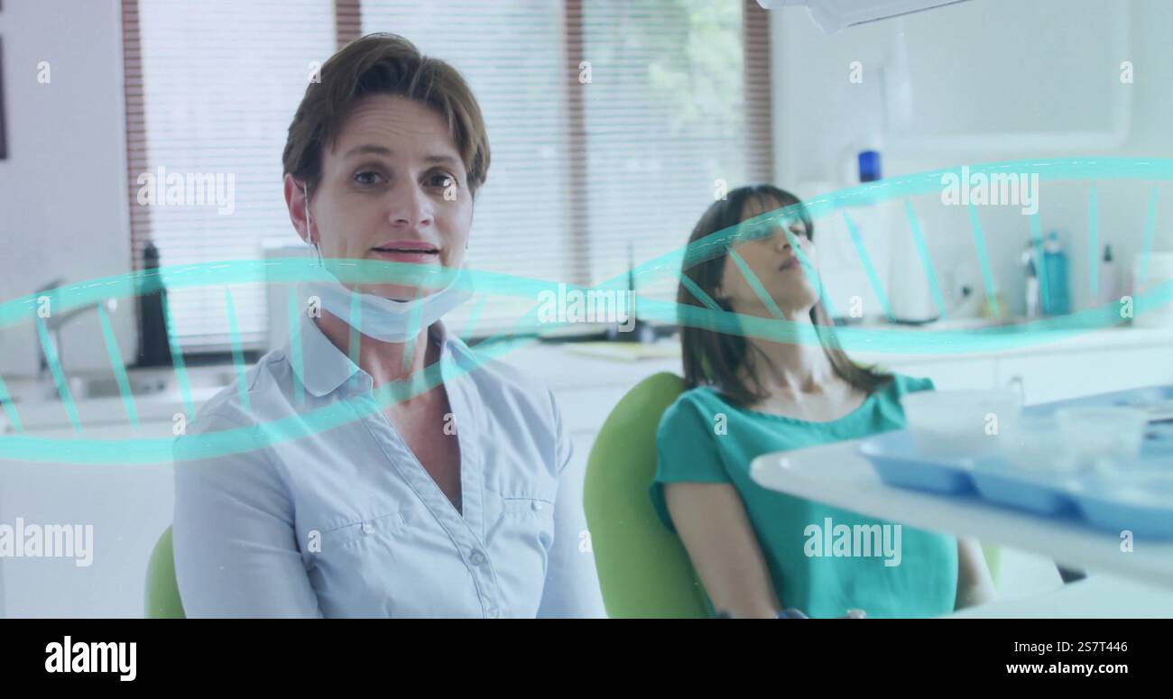 Image of dna strand over caucasian female doctor and patient Stock ...