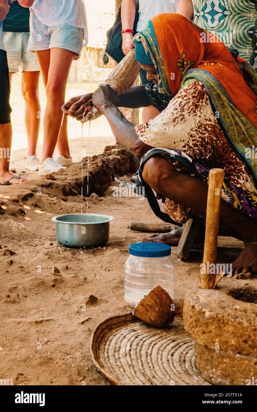 View of aShirazi Tribe woman demonstrating to tourists traditional ...