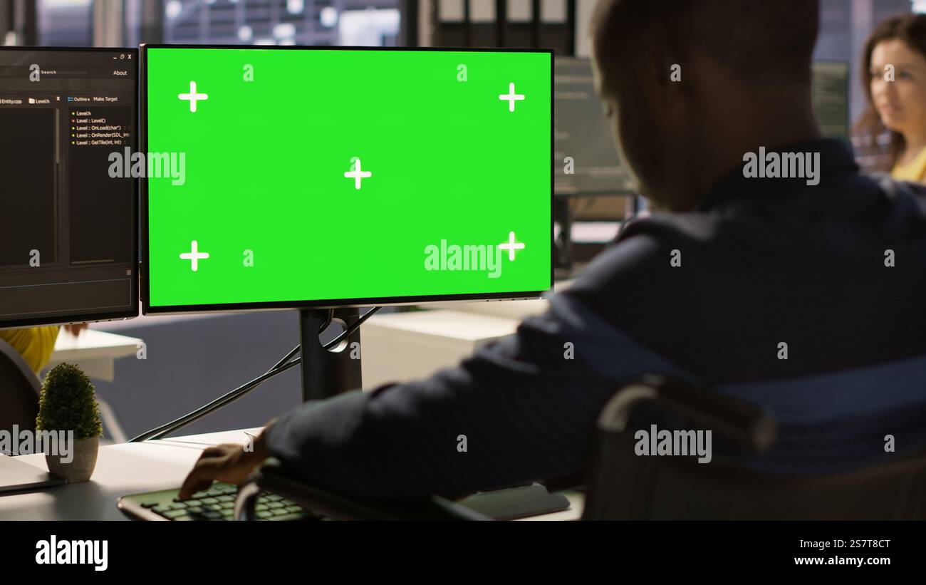 Man with disability in inclusive workplace working with machine ...