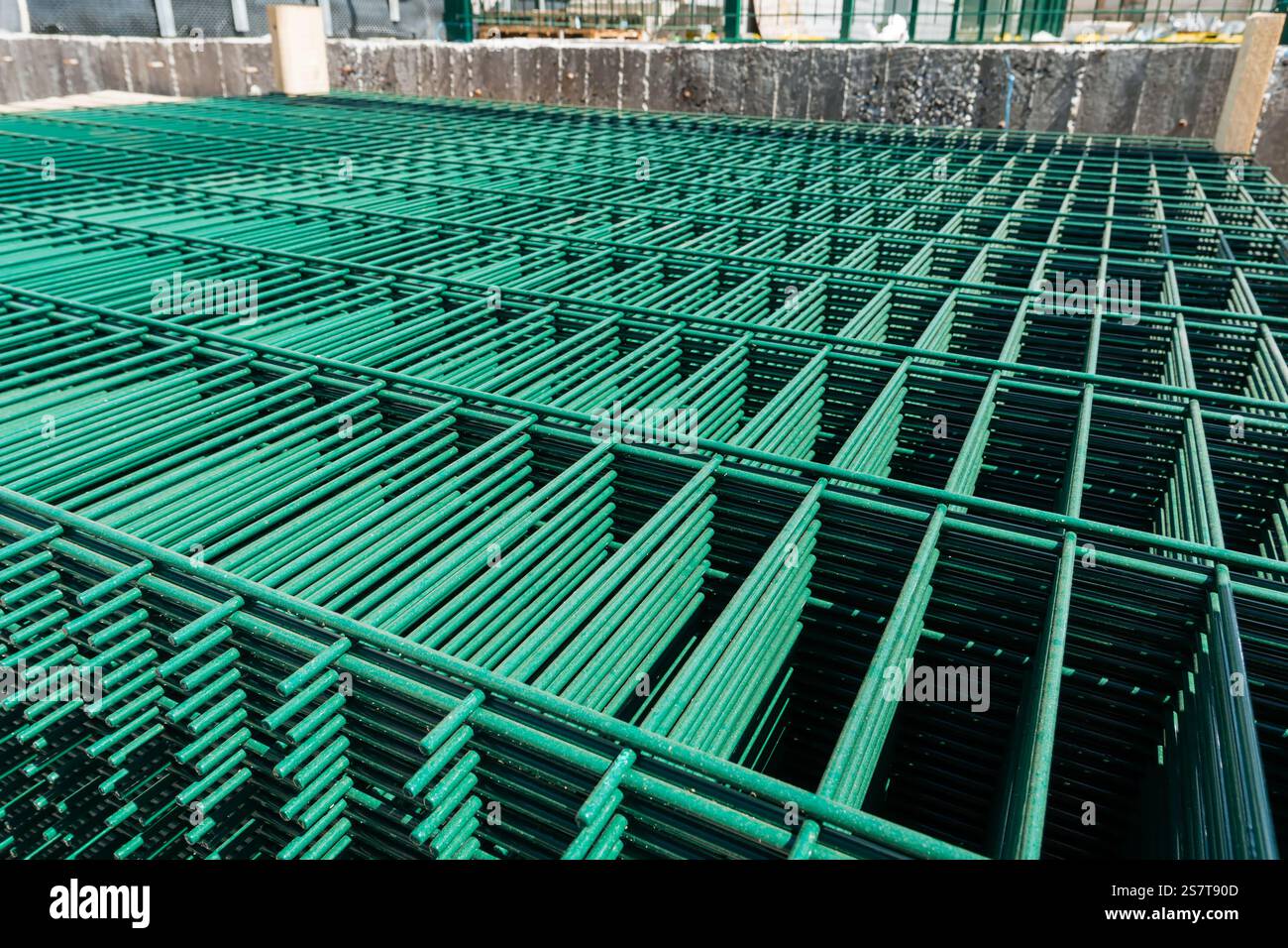 Close-up top view of factory packaging (stack) with metal lattice ...