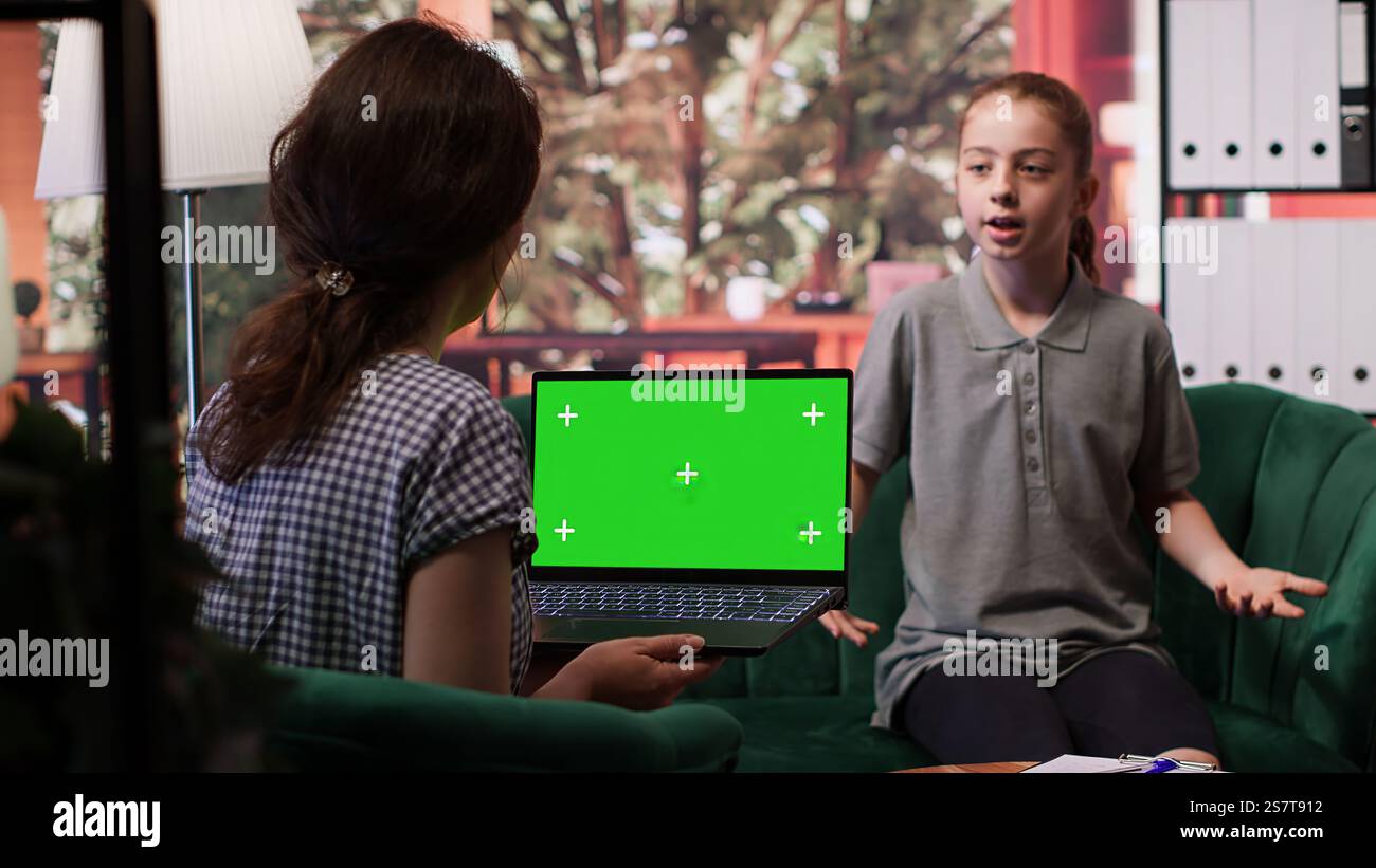 Teen girl in behavioral therapy next to copy space mockup discussing ...