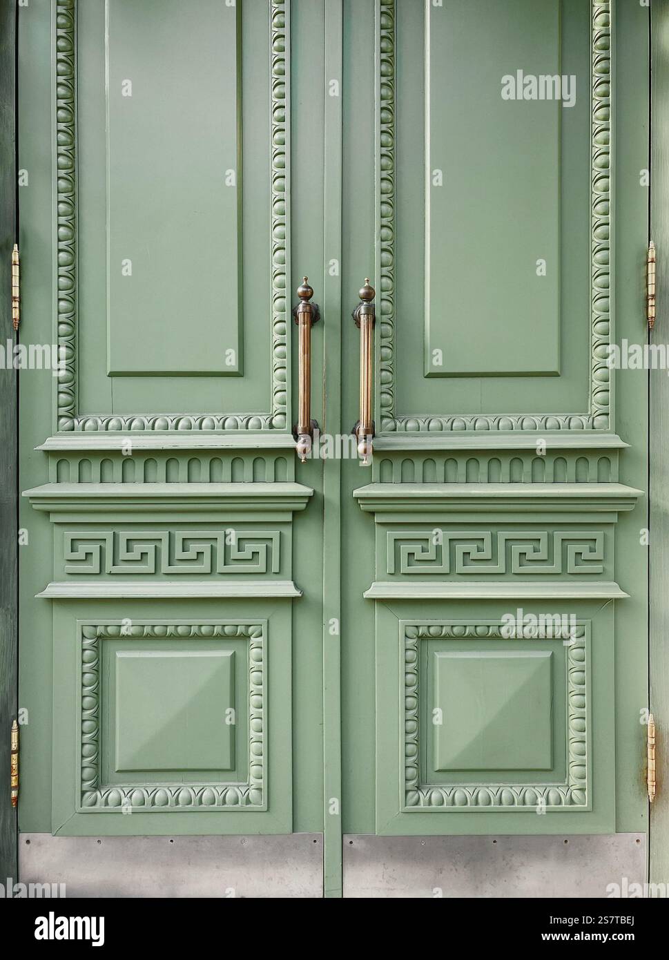 Light green door of an old house. Entrance to 19th century building ...
