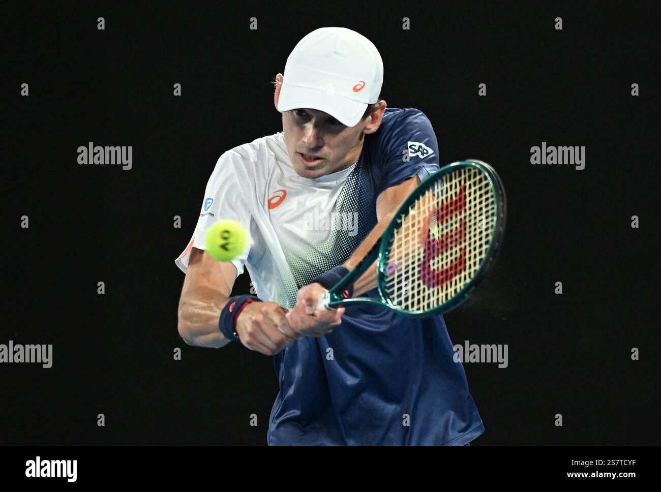 Melbourne, Australia. 20th Jan, 2025. Alex De Minaur of Australia returns during his round 4 ...