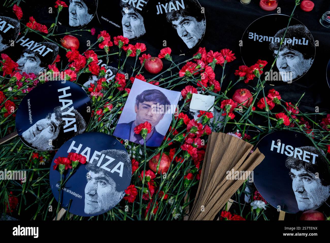The portrait of Hrant Dink painted by artist Timur Celik is placed ...