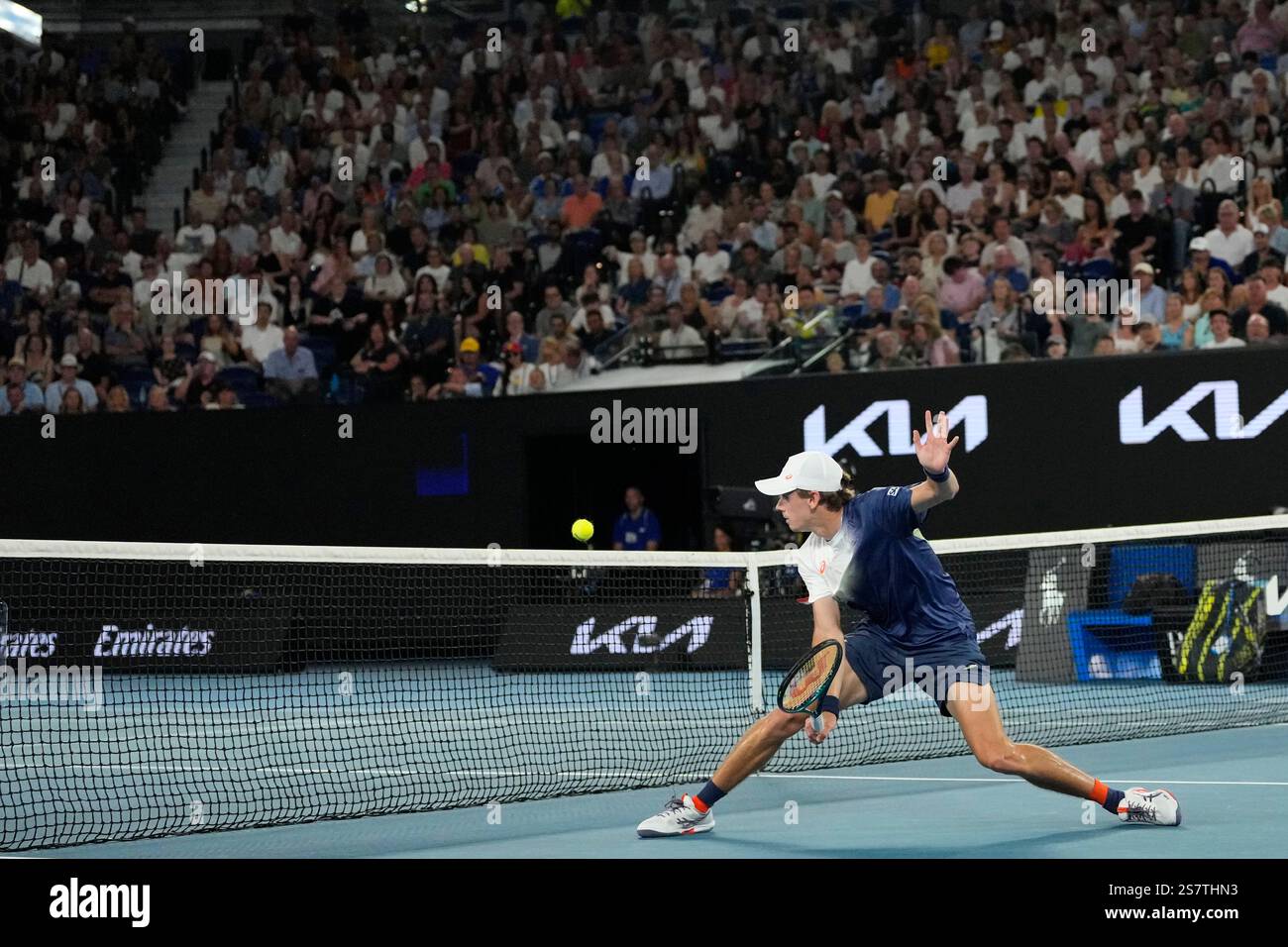 Alex de Minaur of Australia plays a backhand return to Alex Michelsen ...