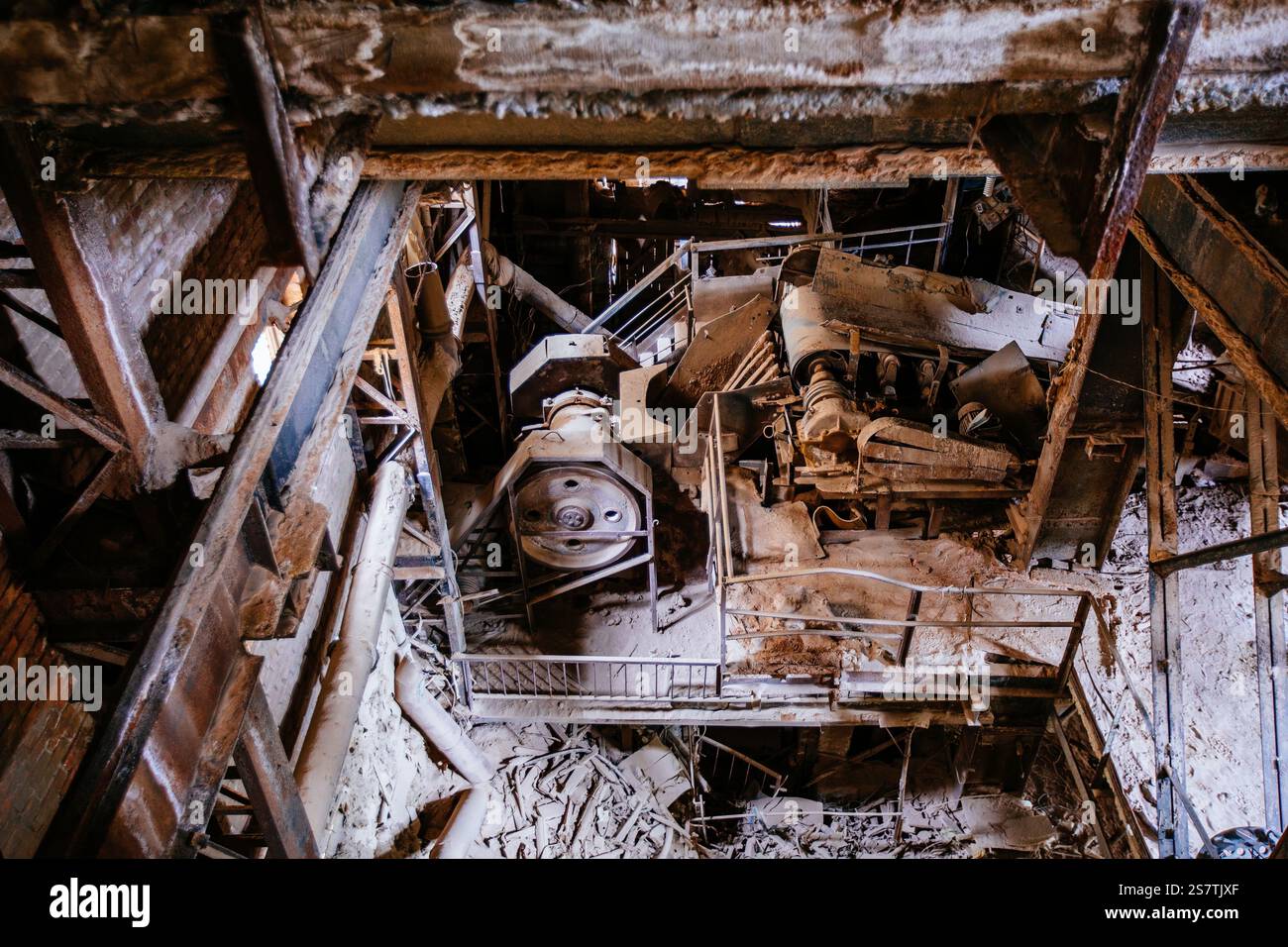 Old broken empty abandoned factory with rusty machines Stock Photo - Alamy