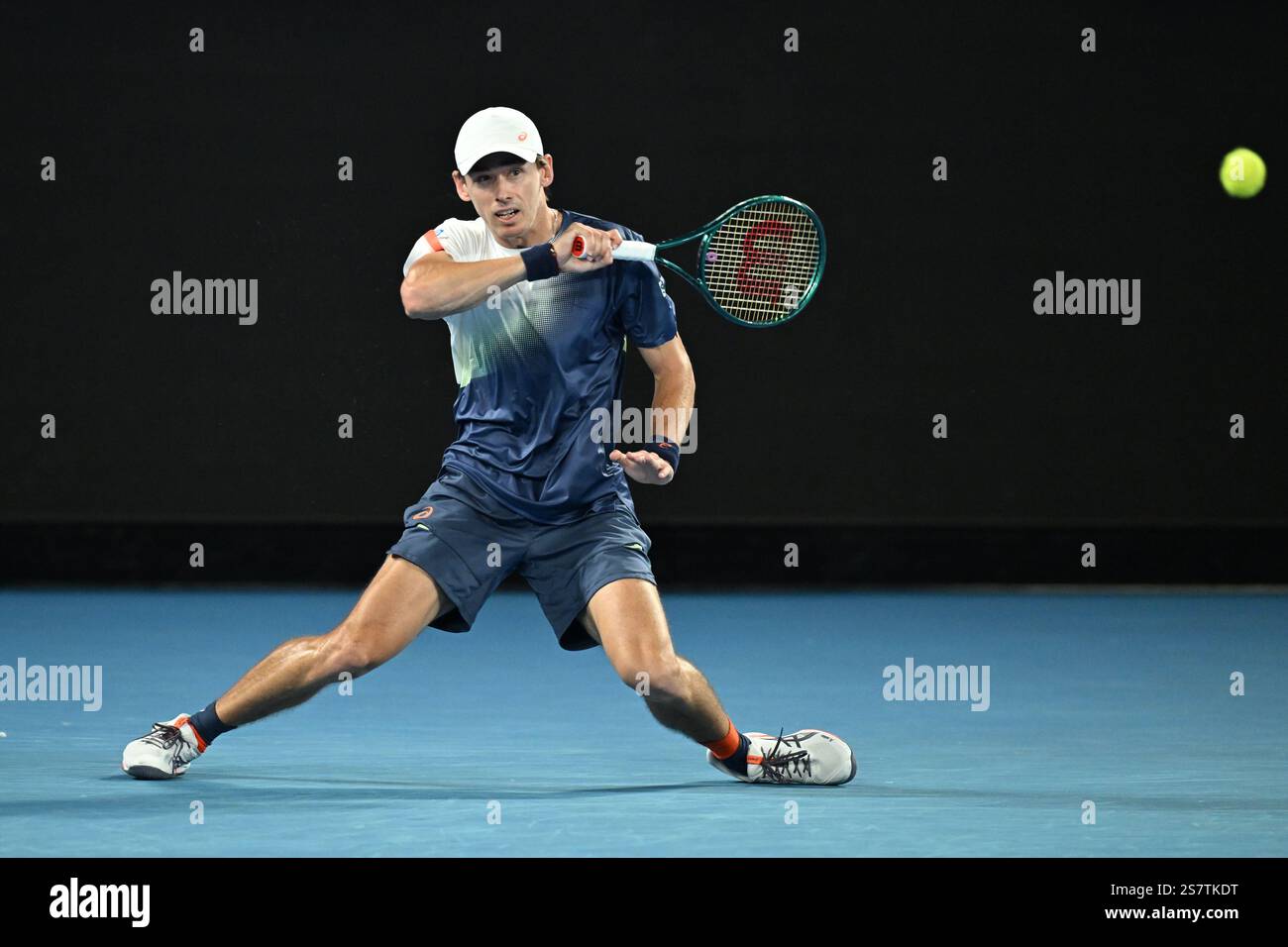 Melbourne, Australia. 20th Jan, 2025. Alex De Minaur of Australia returns during his round 4 ...