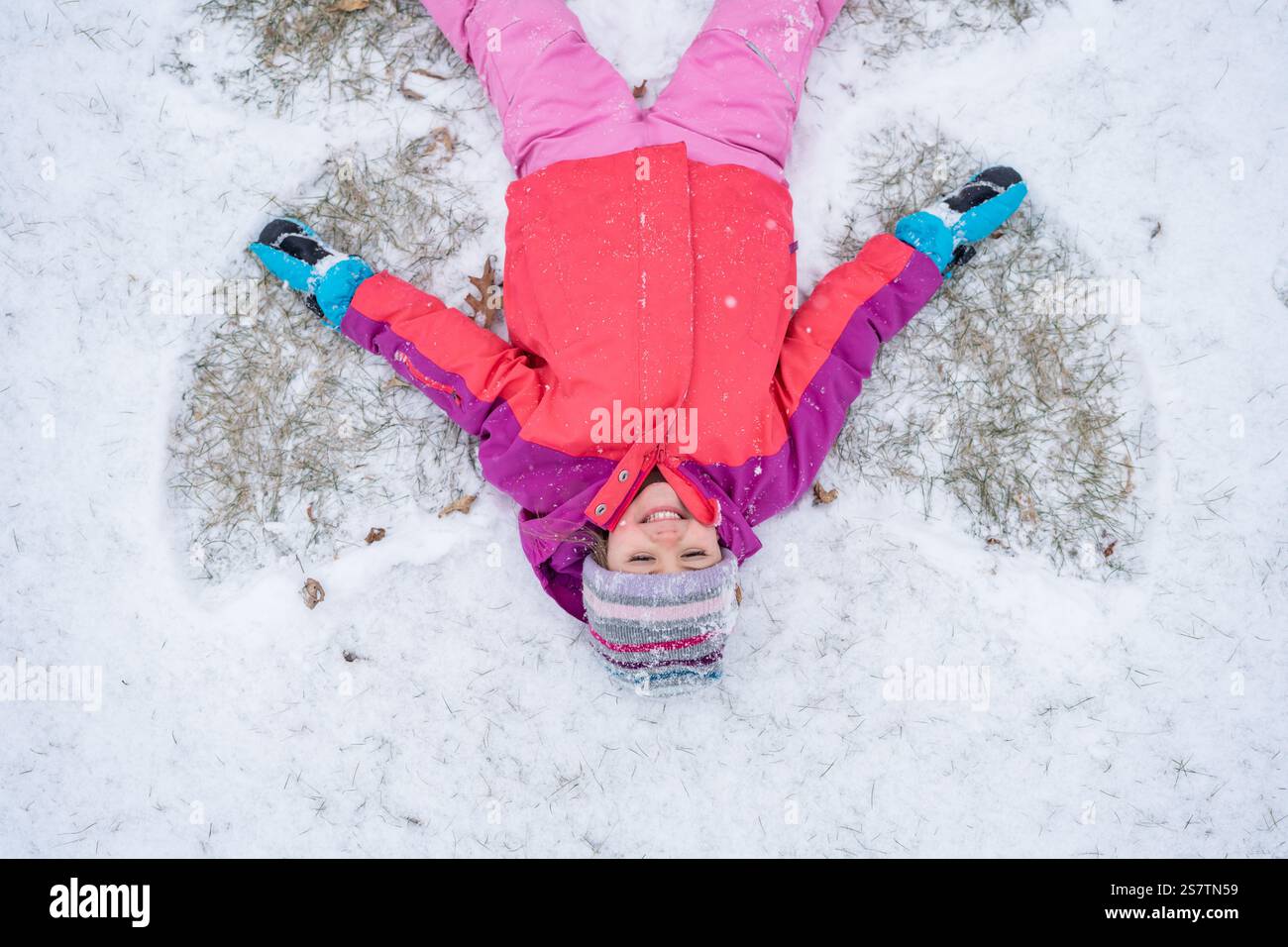 Happy children sliding in winter hi-res stock photography and images ...