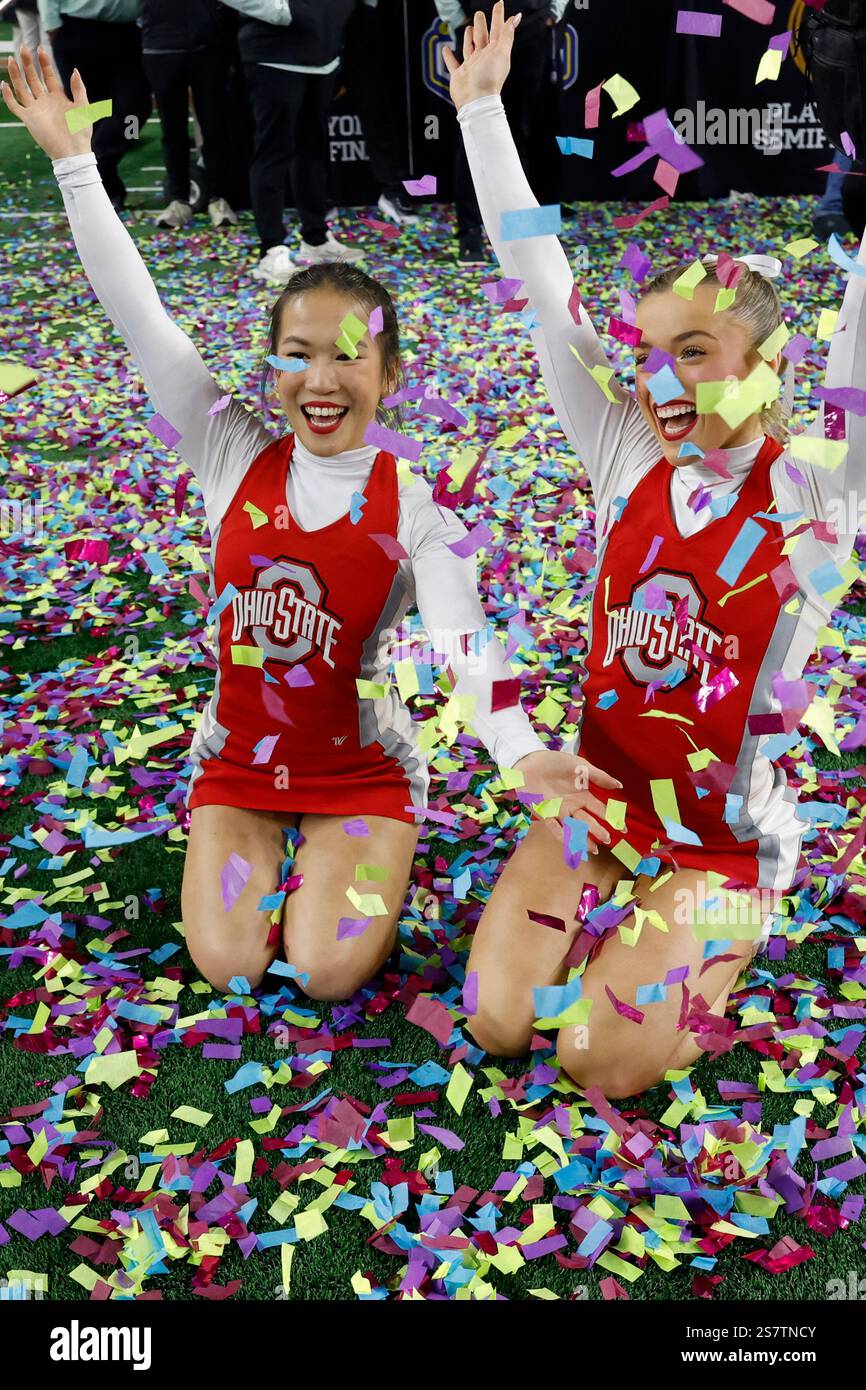 Two Ohio State cheerleaders among confetti after the NCAA CFP semi ...