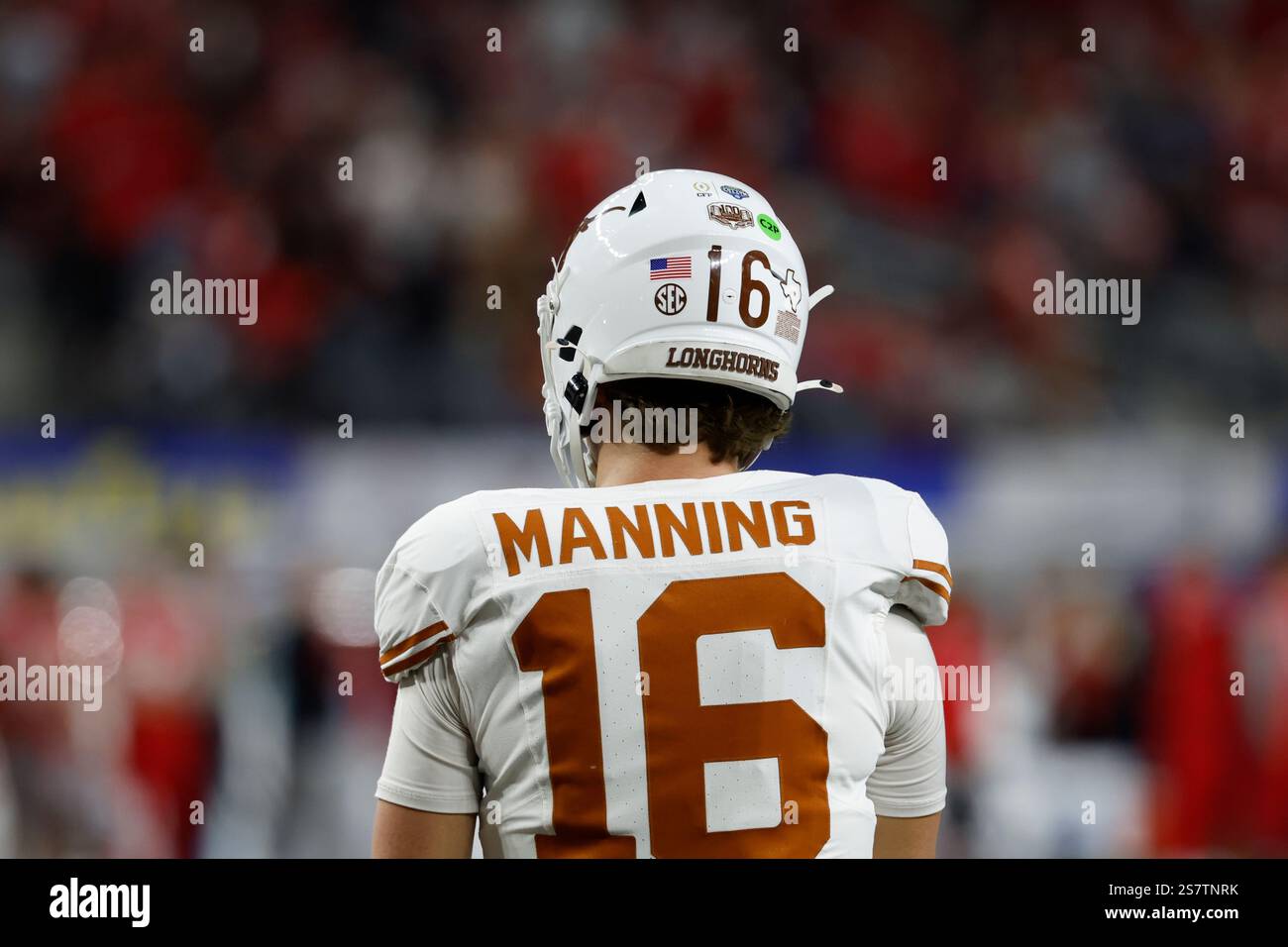 Texas quarterback Arch Manning (16) seen from the back with helmet ...