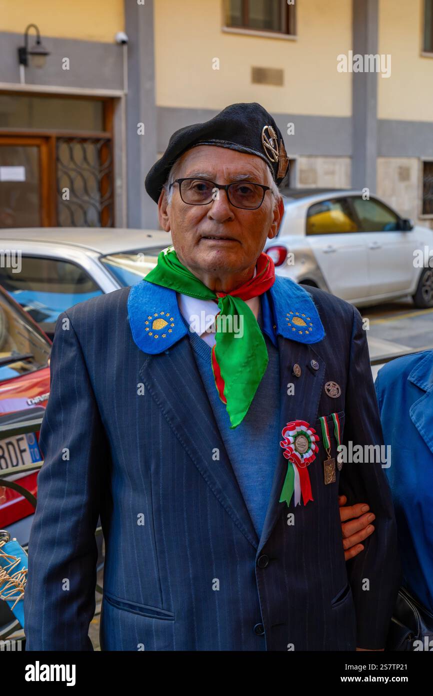An Italian military veteran with his medals after a war memorial ...