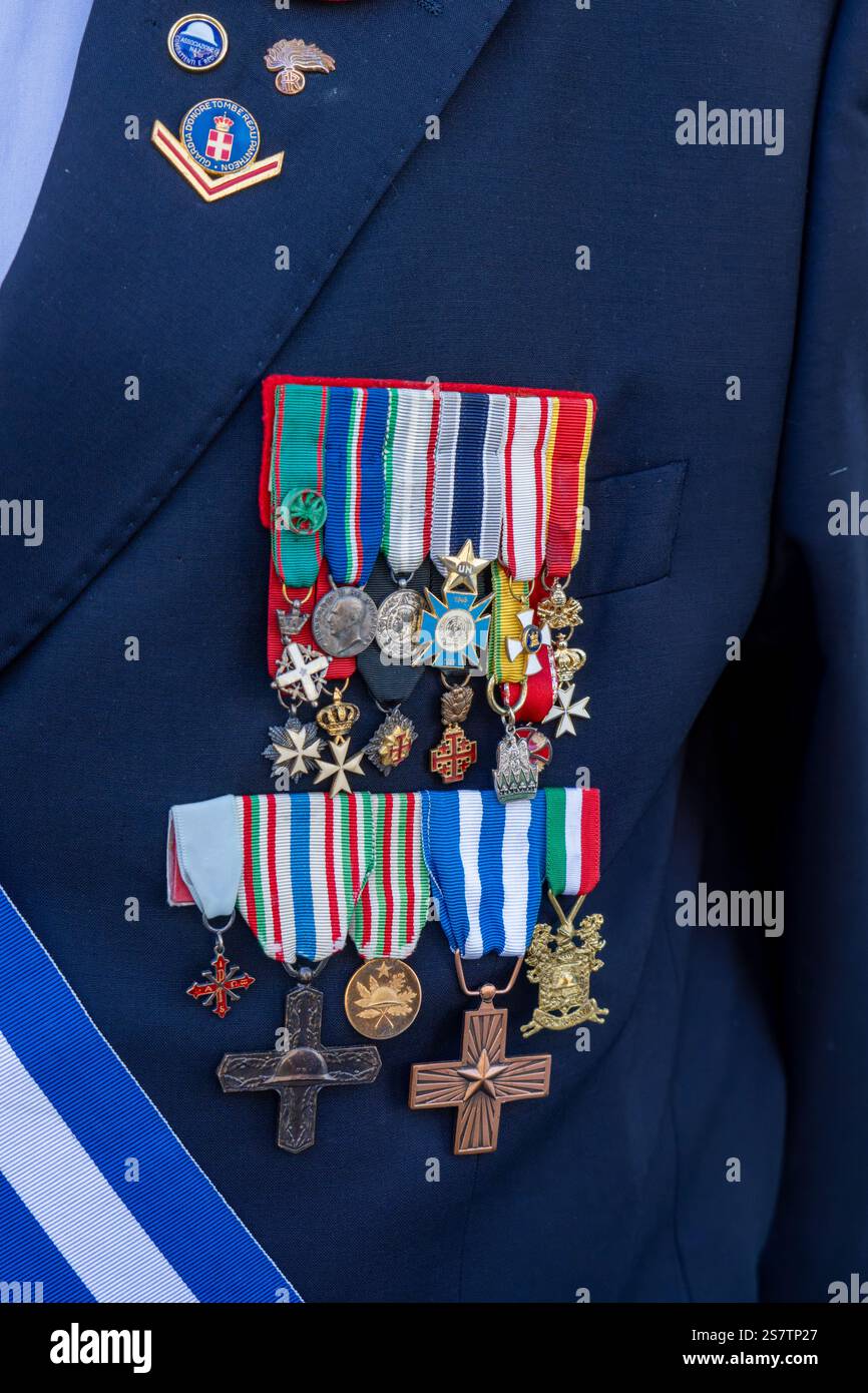 An Italian military veteran with his medals after a war memorial ...