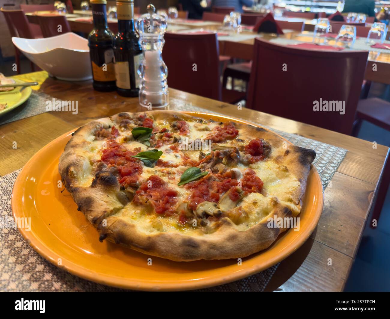 A typical Italian-style pizza in a restaurant / pizzeria in Sorrento ...