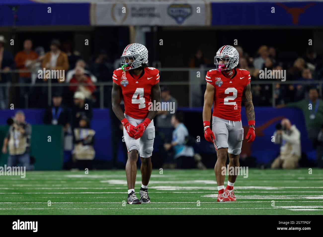 Ohio State wide receiver Emeka Egbuka (2) and Jeremiah Smith (4) line ...