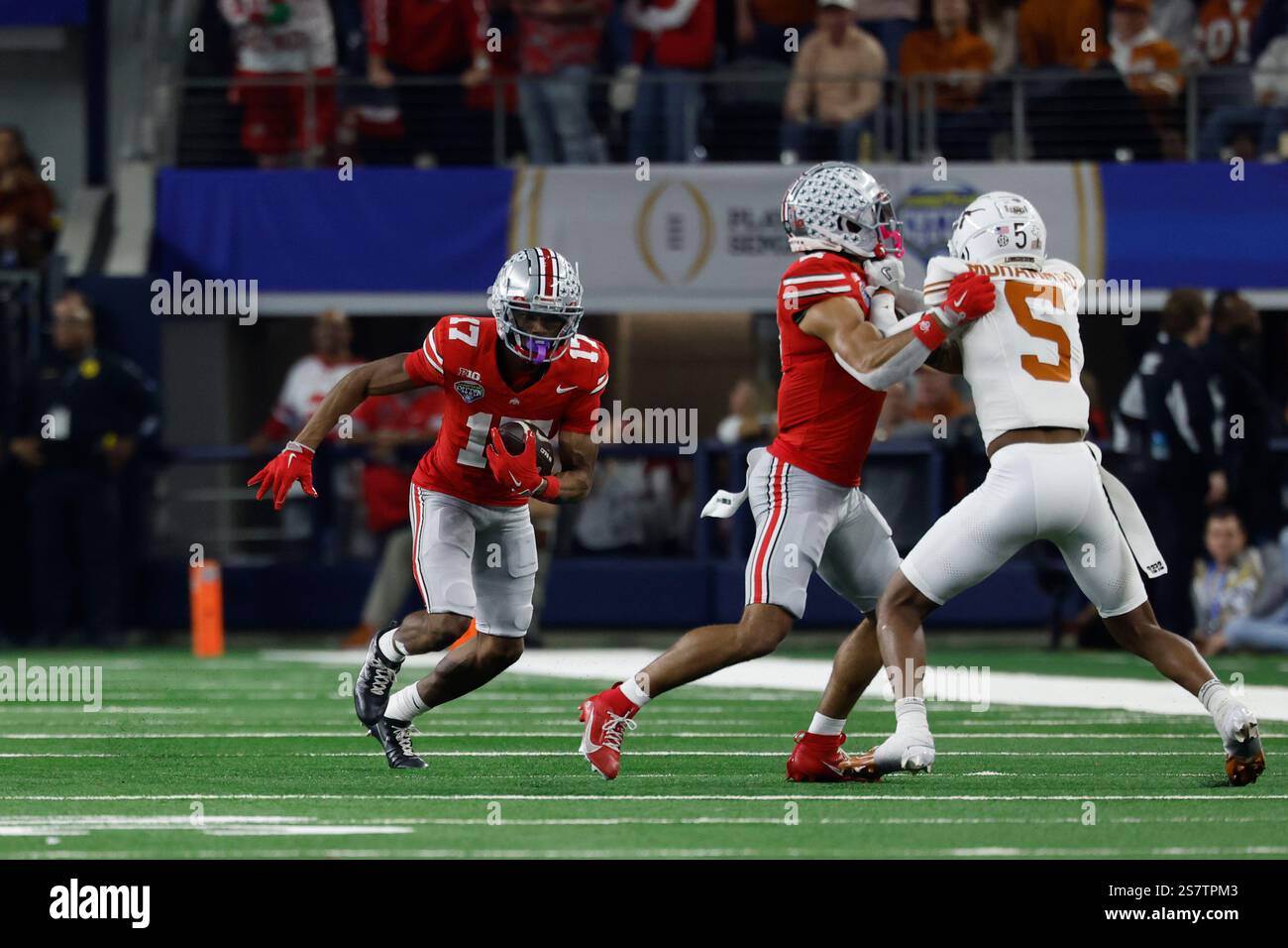 Ohio State wide receiver Carnell Tate (17) carries the ball after a ...