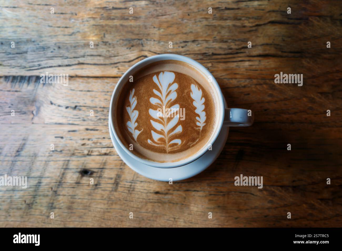 Overhead view of latte in window light Stock Photo - Alamy