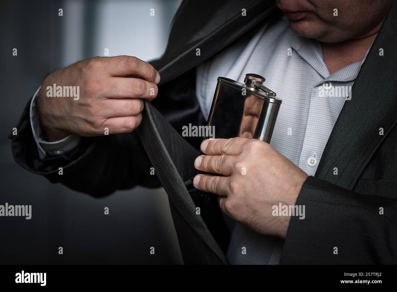 Hiding alcohol at work desk hi-res stock photography and images - Alamy