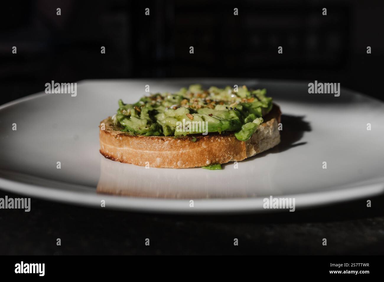 Toast with mashed avocado hi-res stock photography and images - Alamy