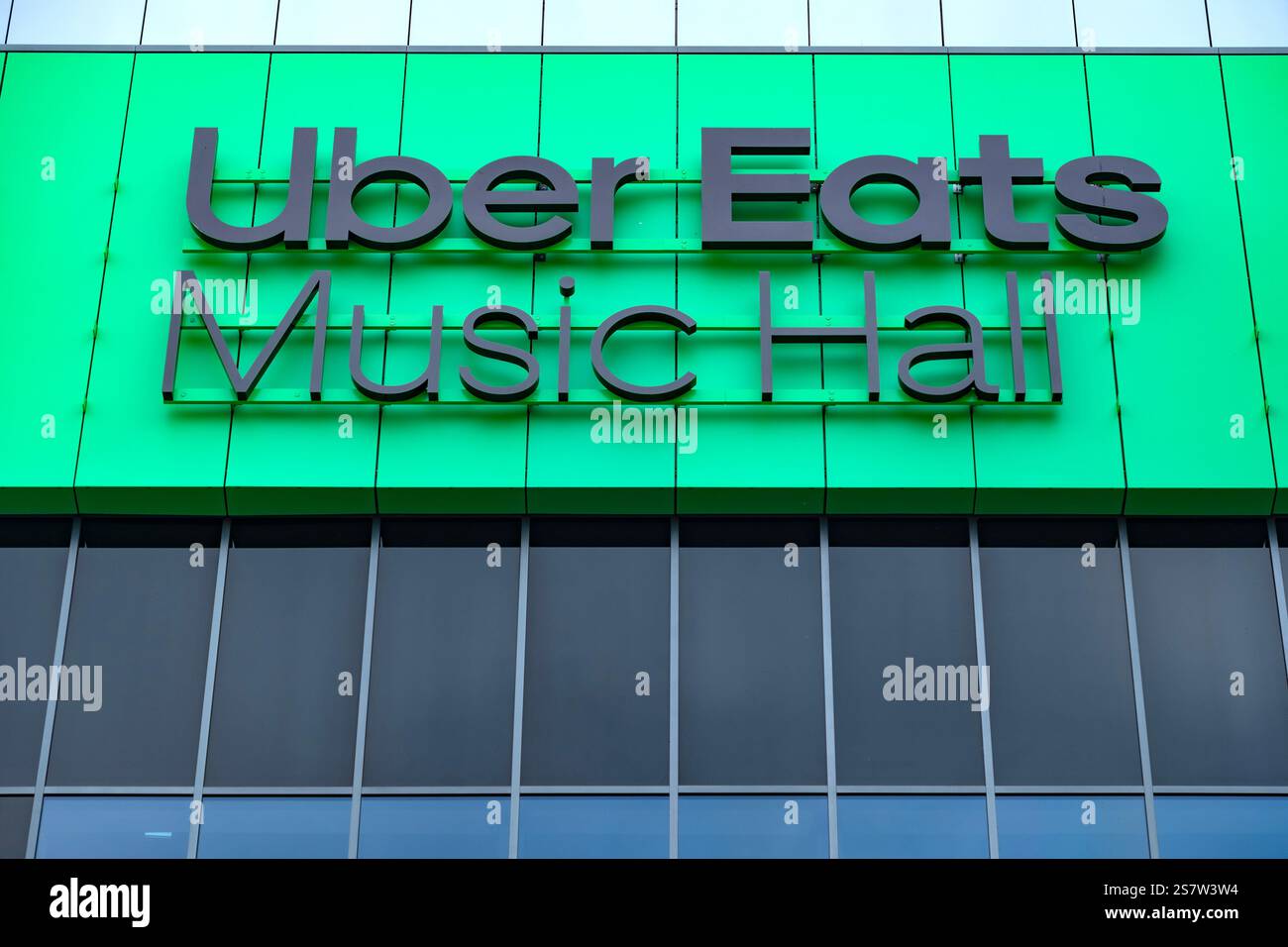 Uber Eats Music Hall Advertising logo on modern building facade, fusion ...