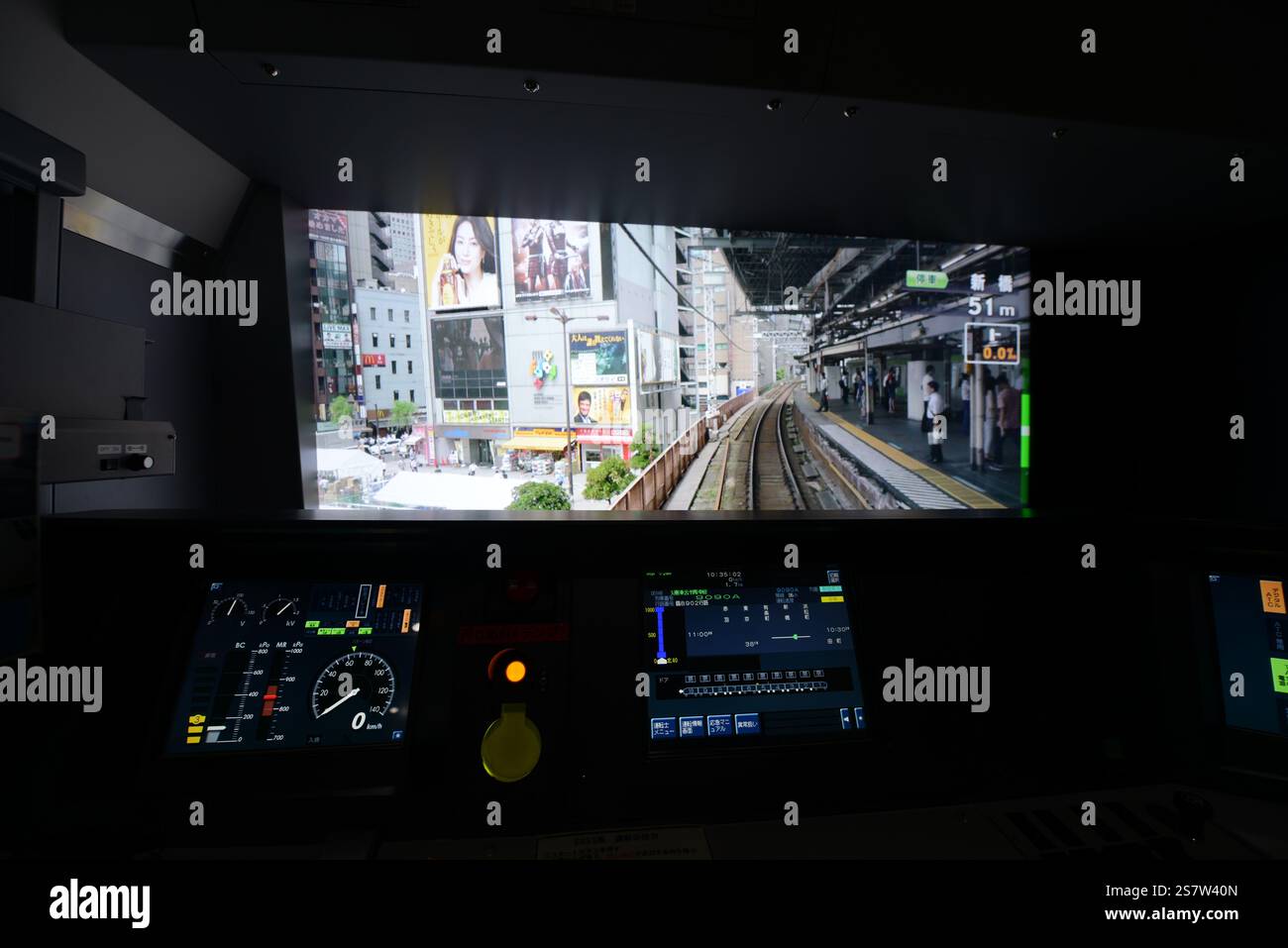Driving a train on a train simulator at the Railway museum in Omiya ...