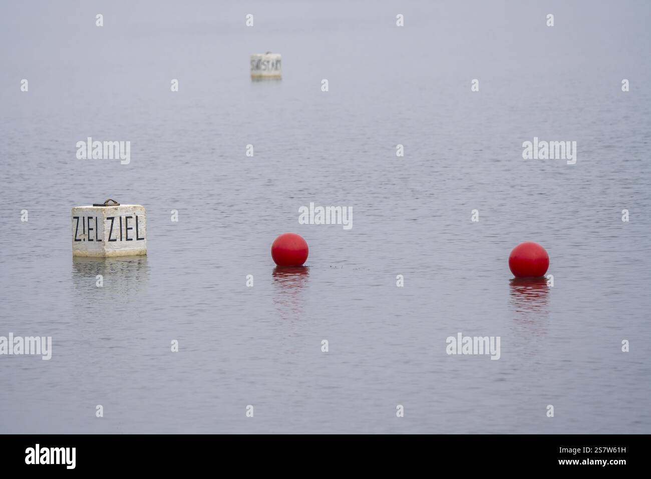 Target buoy on a lake, red marker buoys for water sports, regattas ...