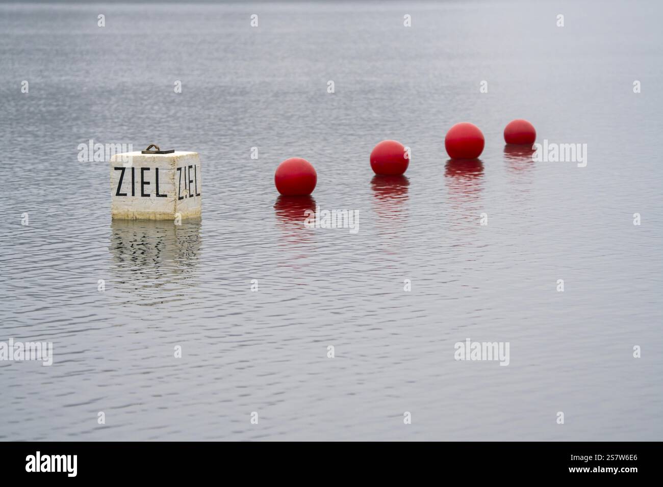 Target buoy on a lake, red marker buoys for water sports, regattas ...