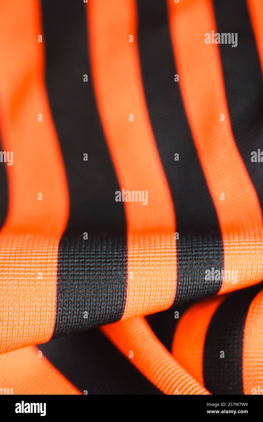 Striped red and black fabric macro close up shot. Satin geometric ...
