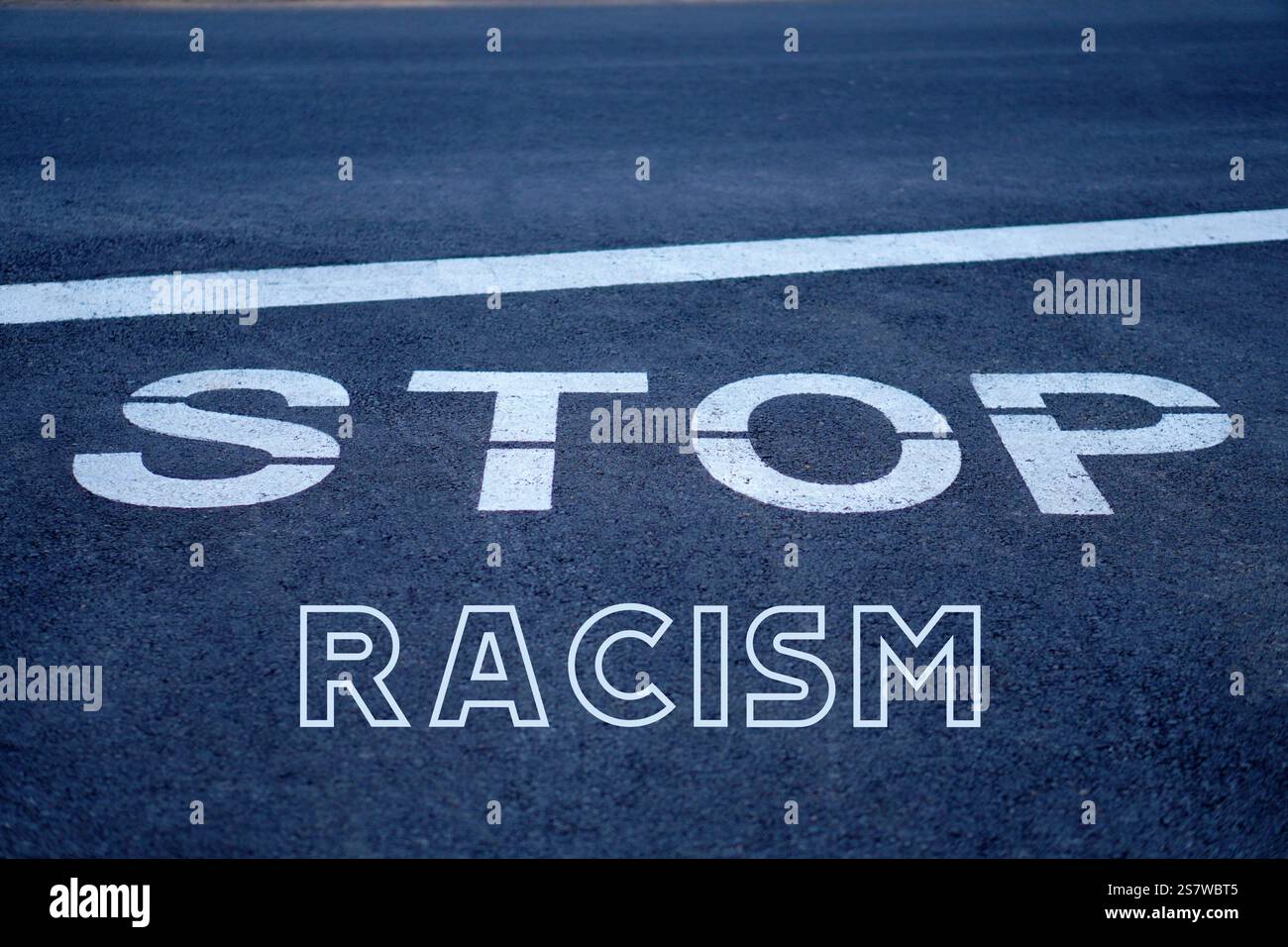 Stop racism concept. social issues. letters written on road signs Stock ...