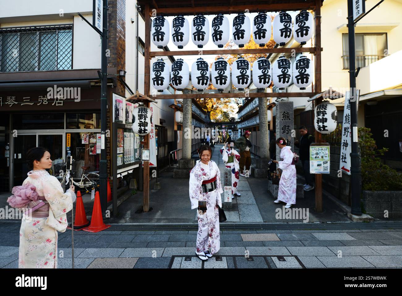 Tourist wearing traditional clothes outside the Kumano Shrine in ...