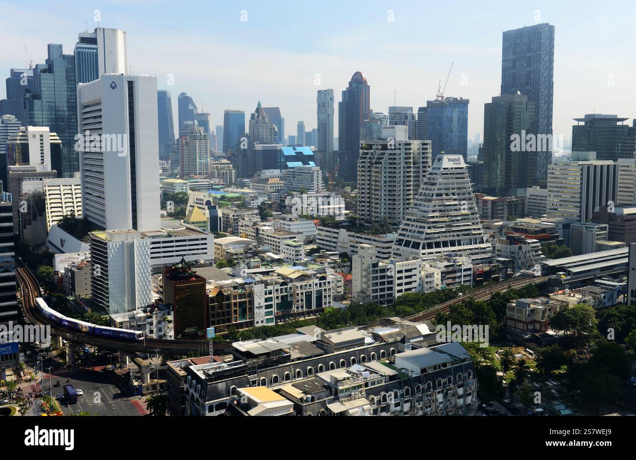 A view of the modern skyline behind Chong Nonsi BTS station in Bangkok ...