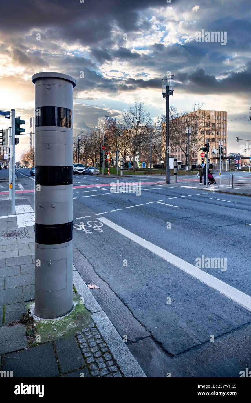 A modern speed control radar installed on a busy Frankfurt street ...