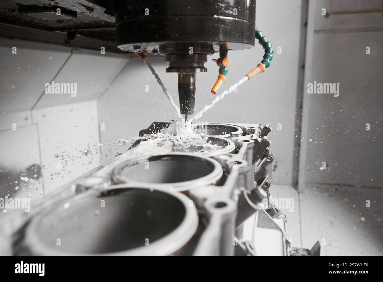 High precision cnc milling machine makes holes in the car engine Stock ...