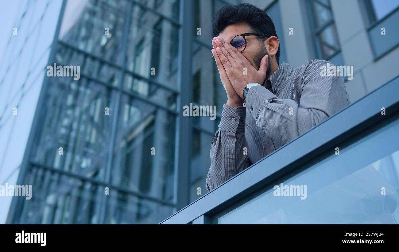 Sorrowful frustrated sad Arabian man desperate Indian muslim ...
