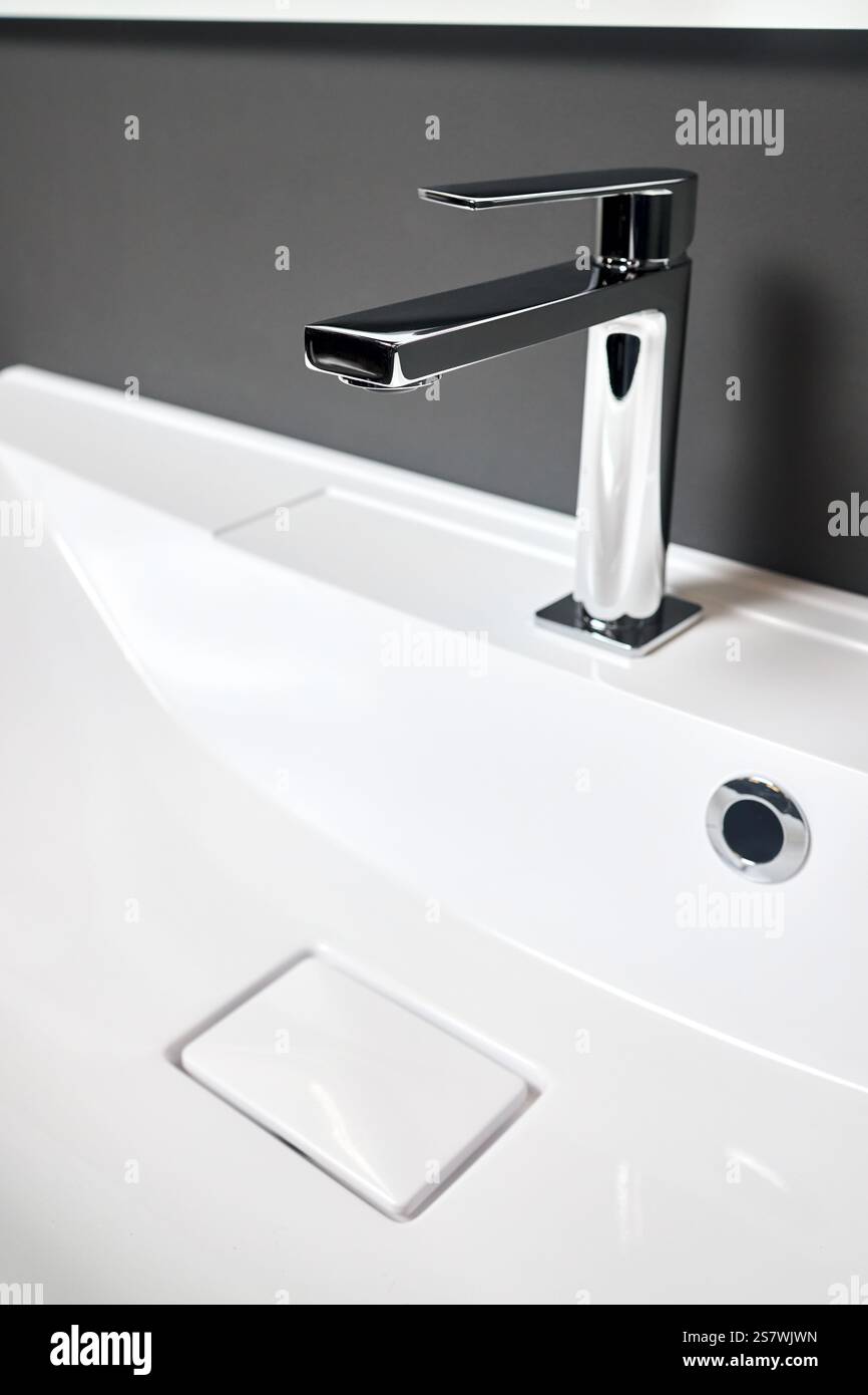 Interior detail of bathroom with luxury square design washbasin sink ...