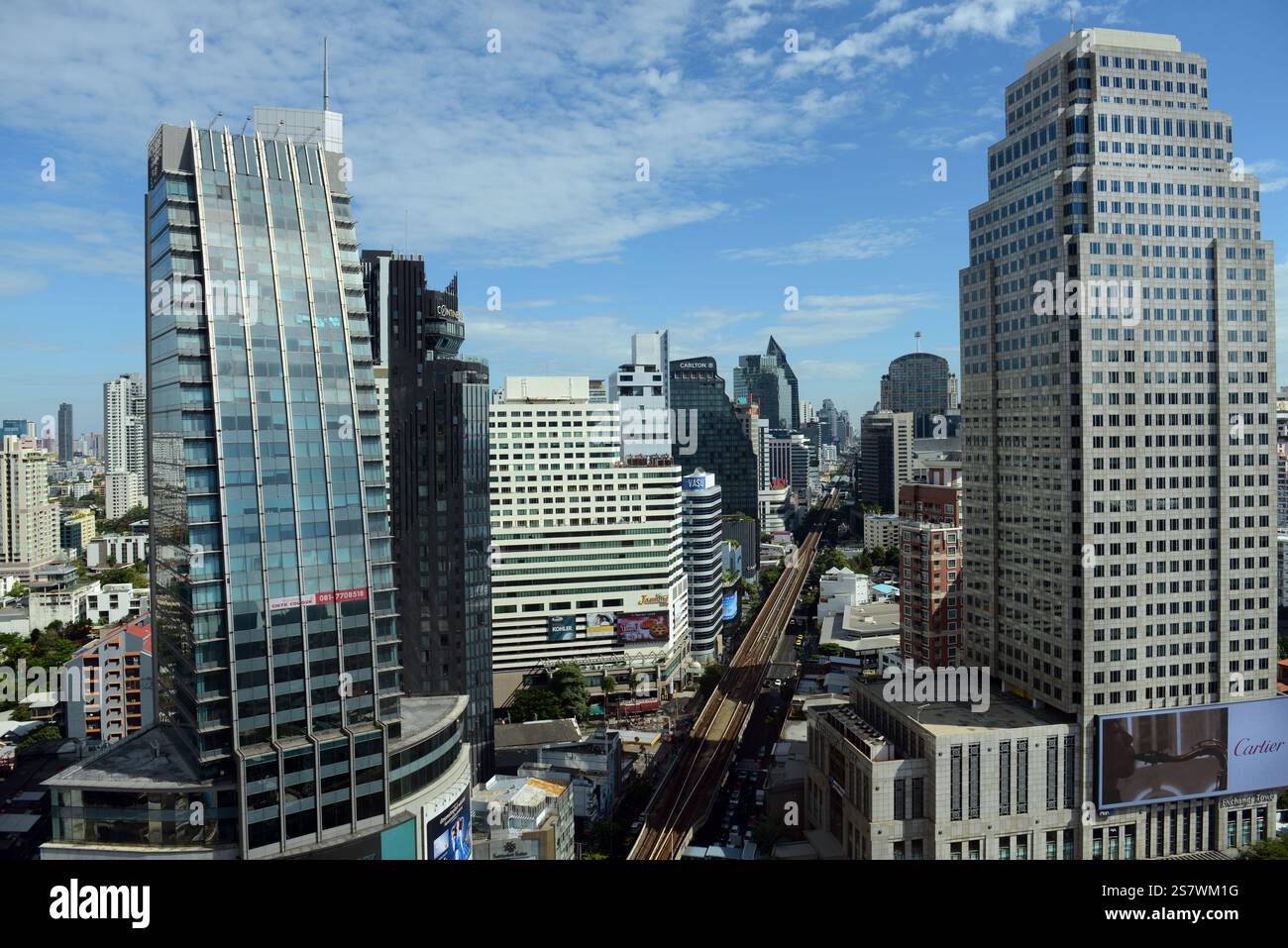 The modern skyline along Sukhumvit Road in Asok, Bangkok, Thailand ...