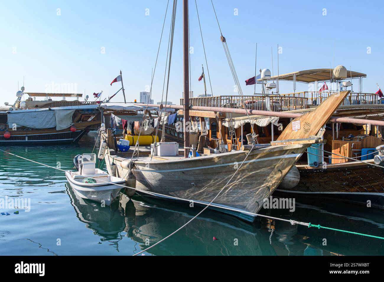 Doha, Qatar - January 4, 2025: Traditional wooden boats, now fitted ...