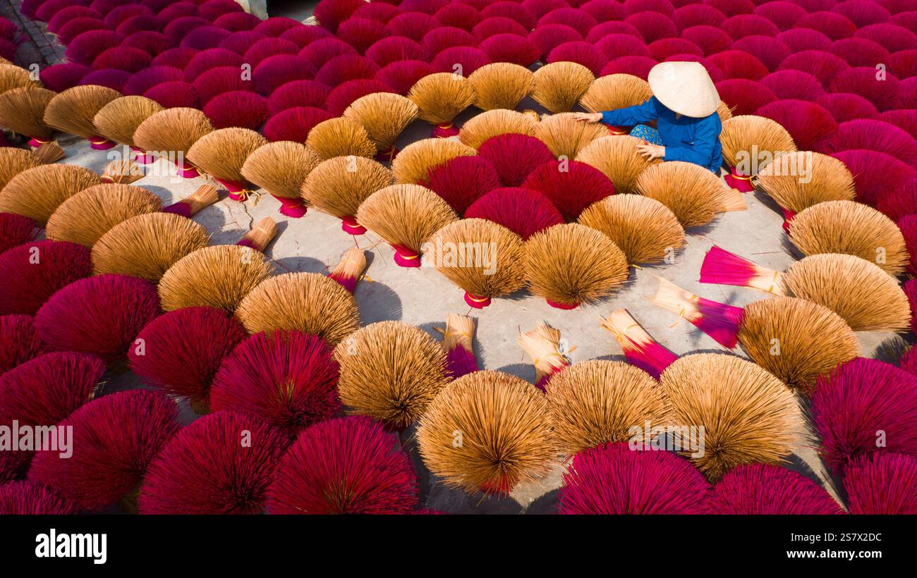 The craft of making incense stands, or "chan huong," in Quang Phu Cau ...