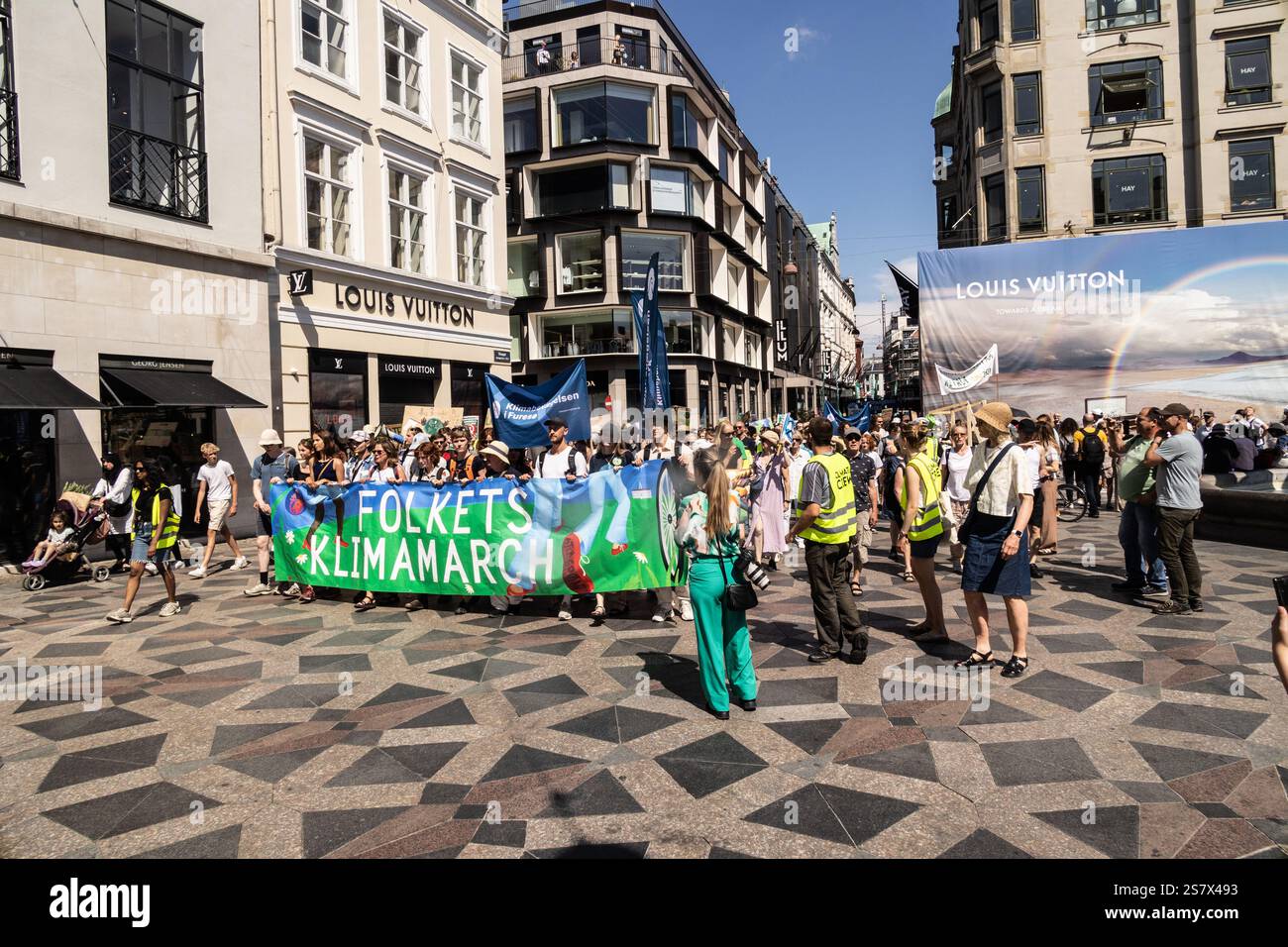 Protesters hold a banner during the ’Folkets Klimamarch. The People's ...