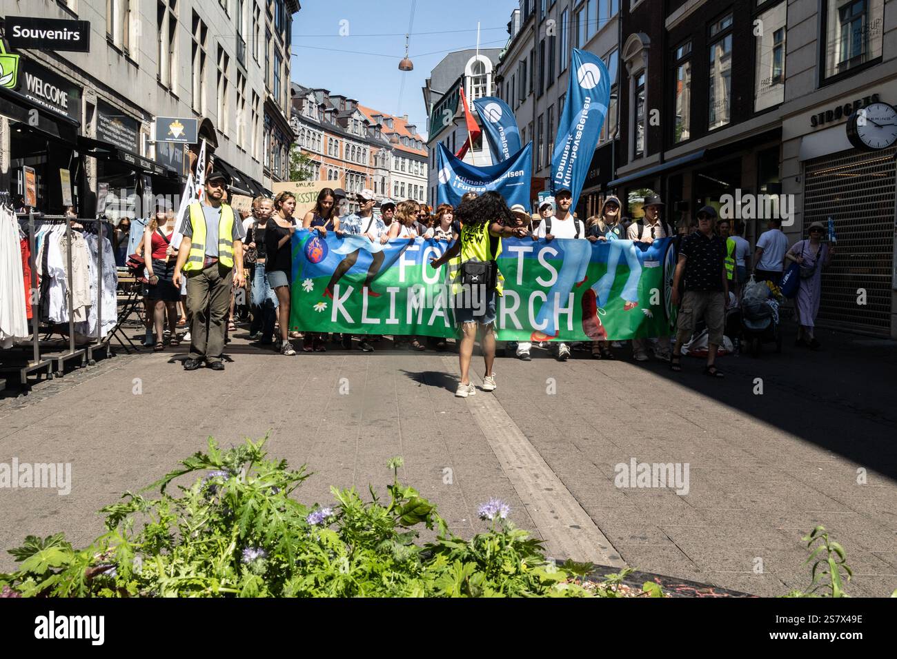 Protesters hold a banner during the ’Folkets Klimamarch. The People's ...