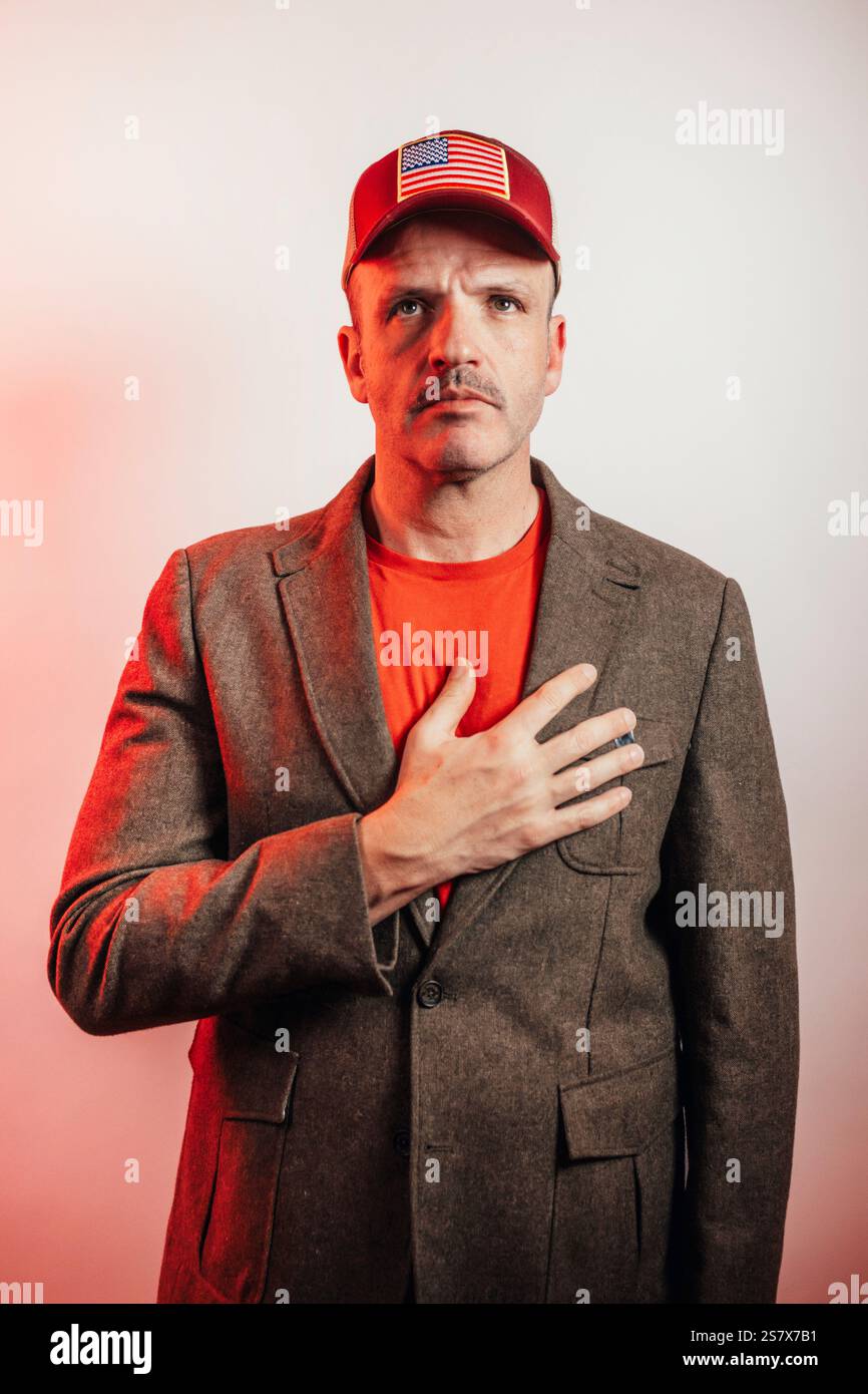 A proud American man with his hand on his chest Stock Photo - Alamy