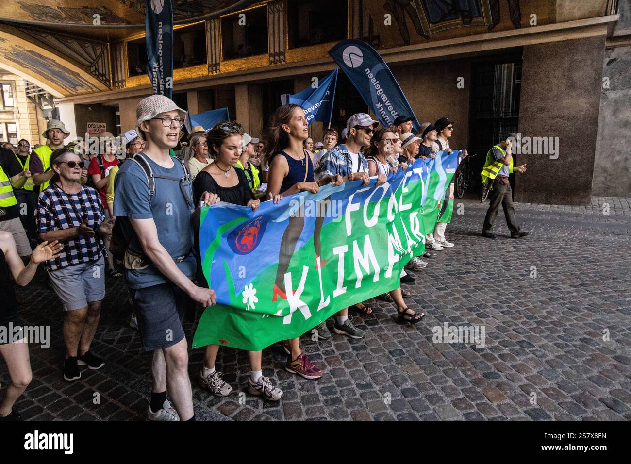 Protesters hold a banner during the ’Folkets Klimamarch. The People's ...