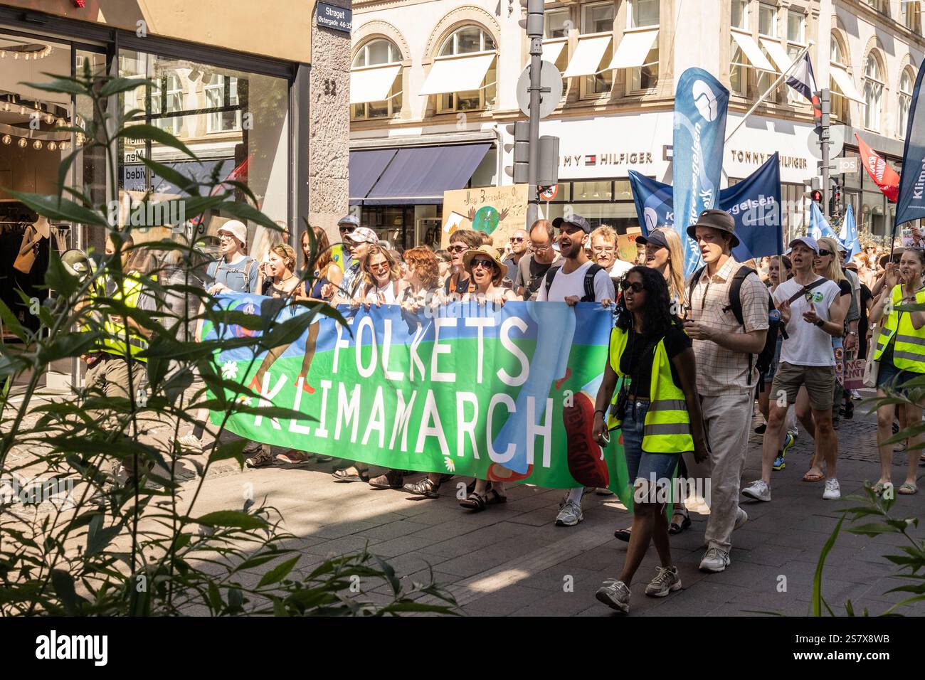 Protesters hold a banner during the ’Folkets Klimamarch. The People's ...