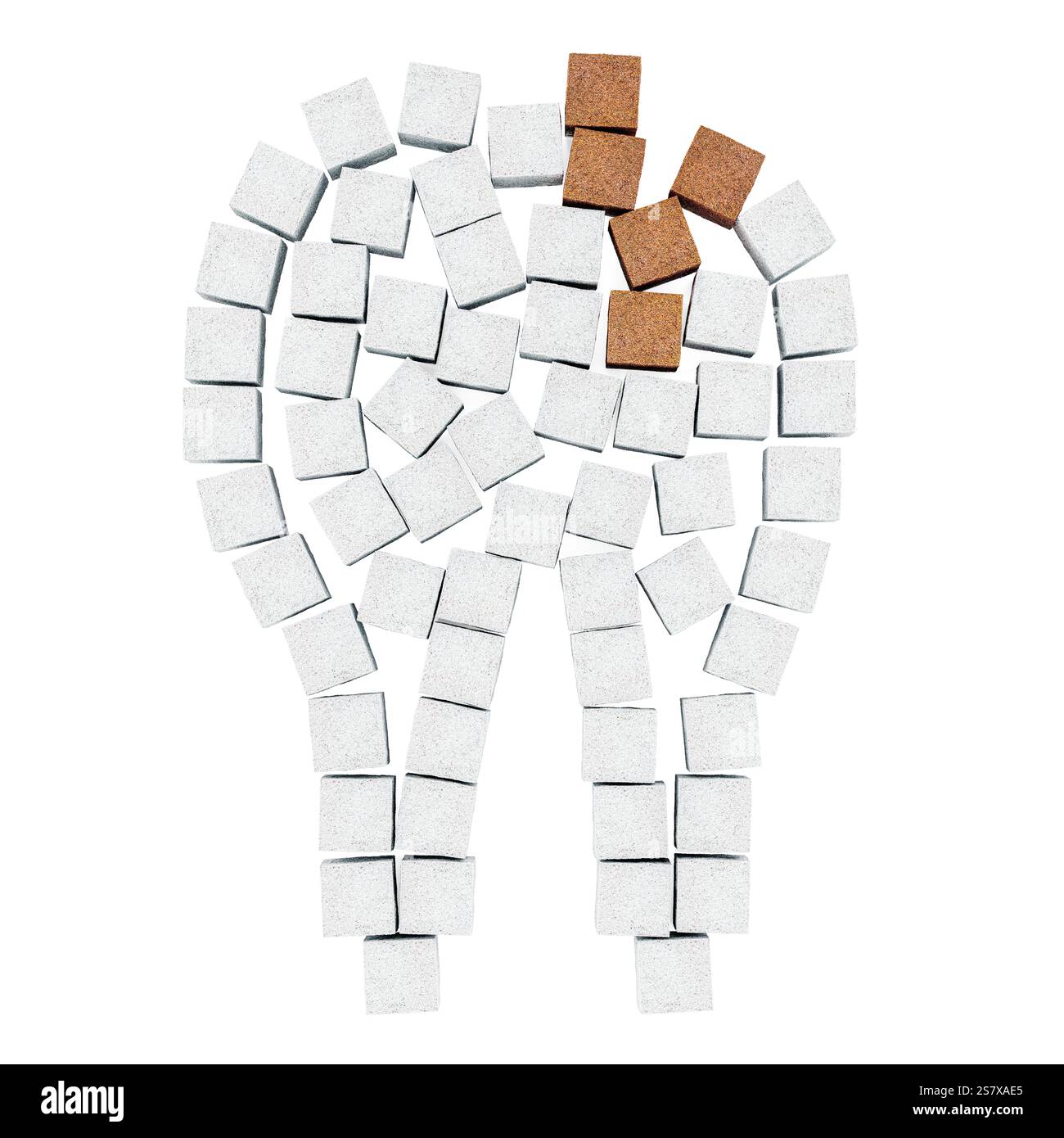 Tooth with caries from sugar cubes. Sugar destroys the tooth enamel and ...