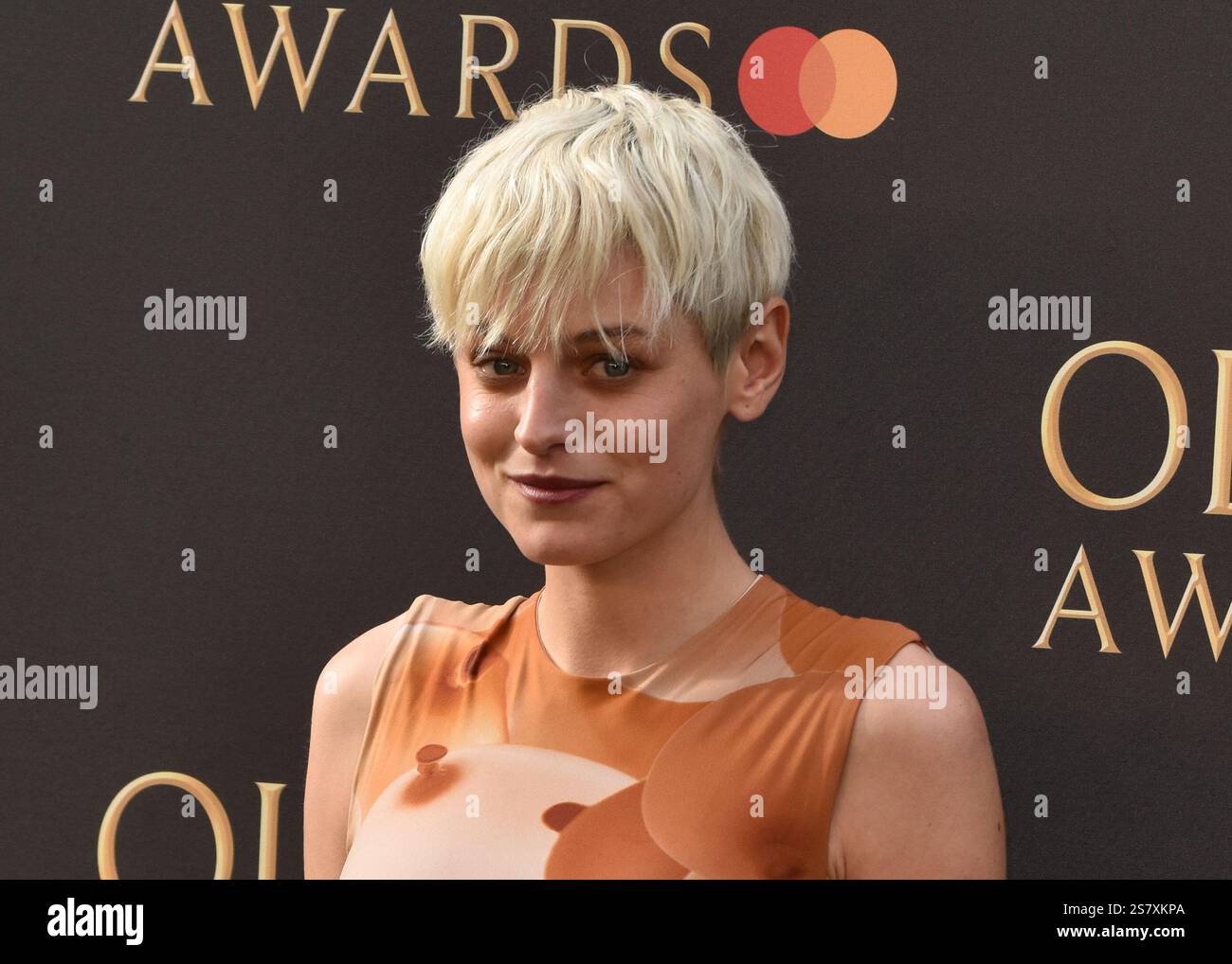 Emma Corrin attends The Olivier Awards at the Royal Albert Hall in ...