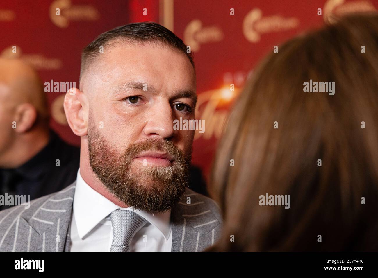 Washington, USA. 19th Jan, 2025. Conor McGregor speaks with press on ...