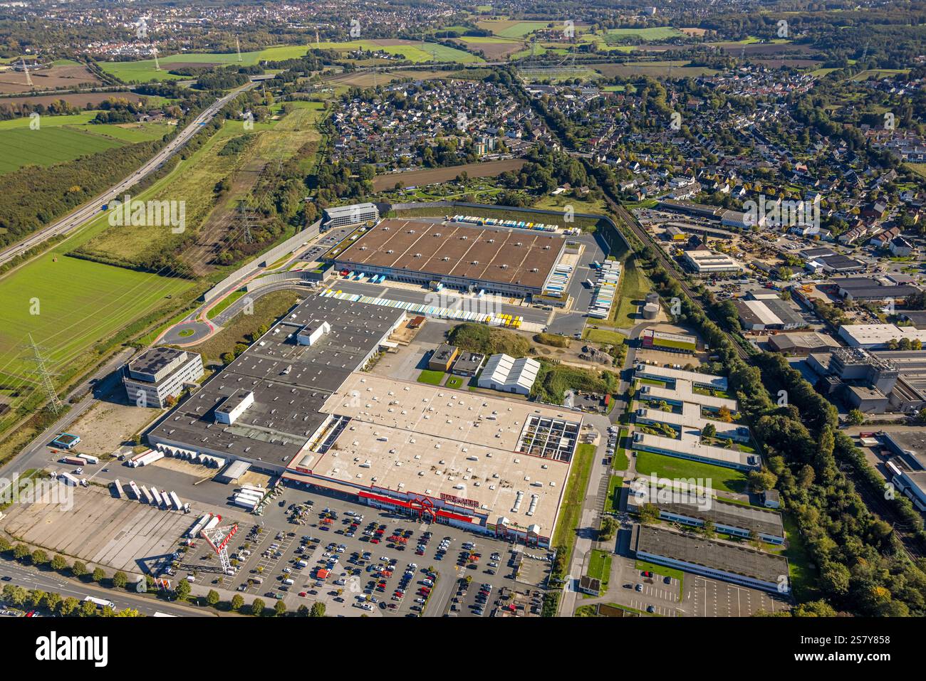 Aerial view, Amazon logistics with container parking lot and Bauhaus ...