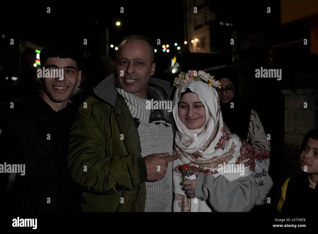Beitunia, Gaza. 20th Jan, 2025. Palestinian prisoner (R), is welcomed ...